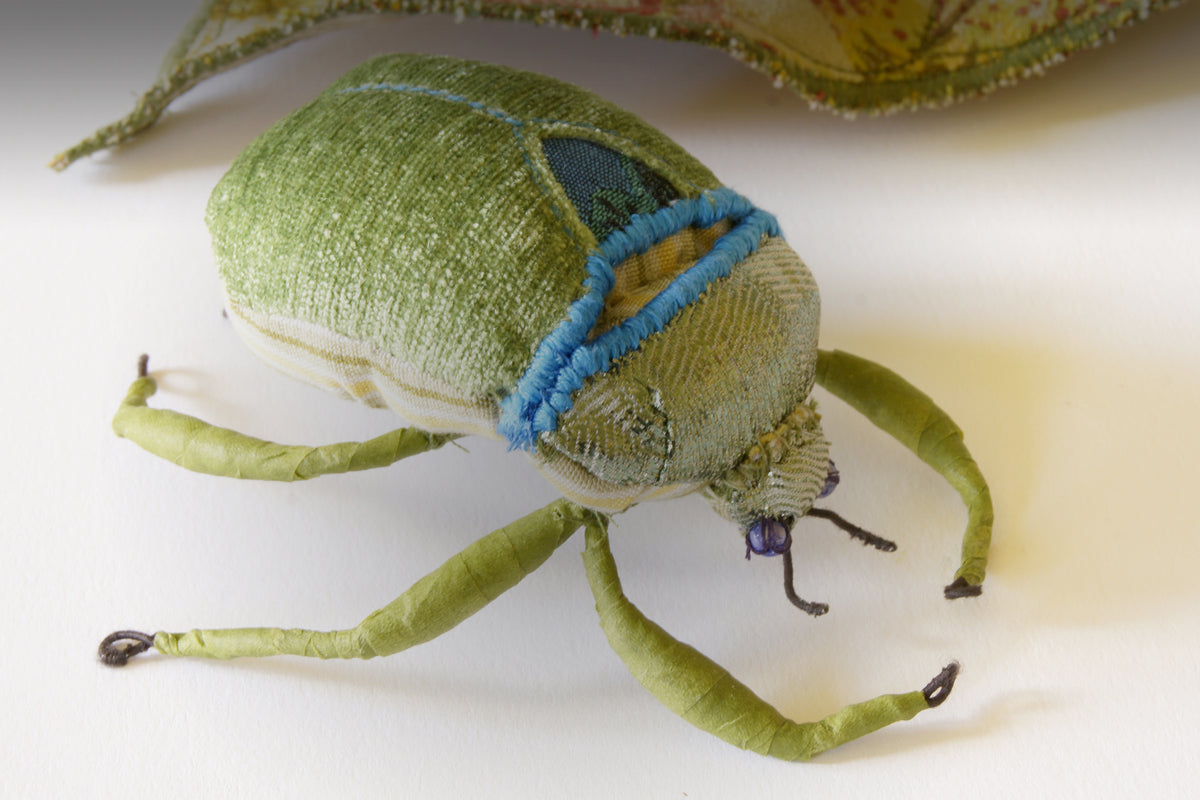 Fiber art insects to wear and collect, handmade in France.